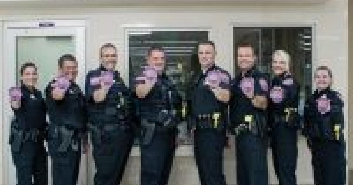 APD officers don ‘pink patches’ to promote breast cancer awareness ...